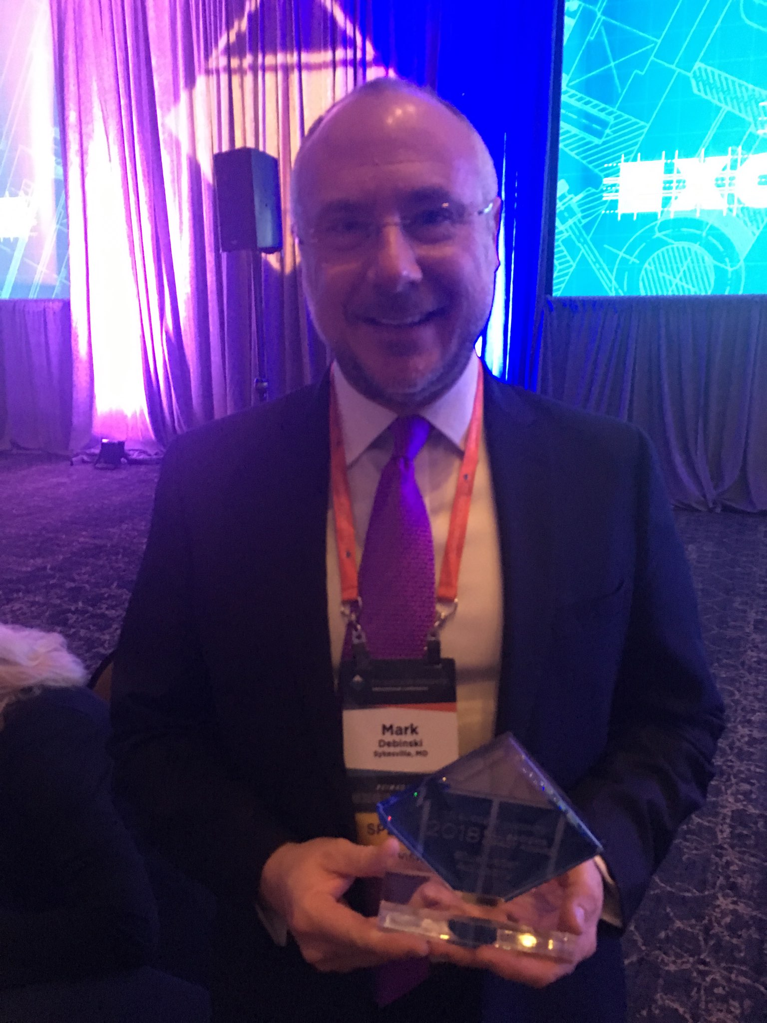 Mark Debinski Honored with Bill Brooks IMPACT Award - Bluewater Advisory